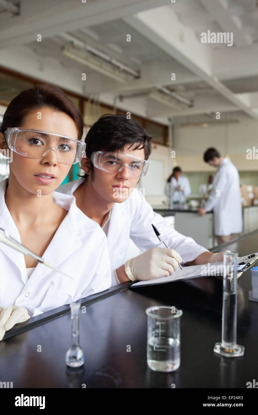 Four young scientists hi-res stock photography and images - Alamy