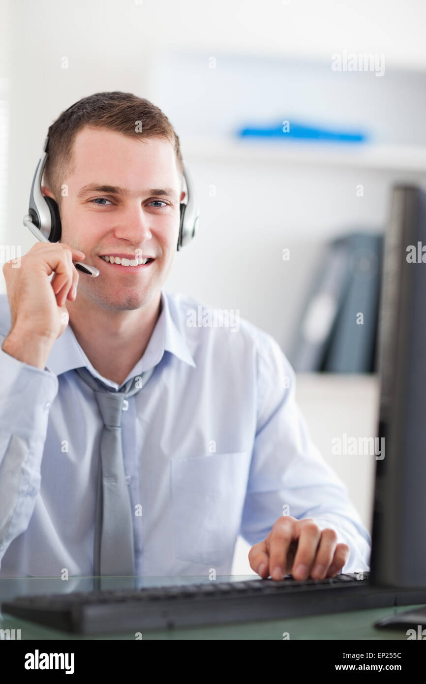 Close up of smiling call center agent speaking with costumer Stock ...