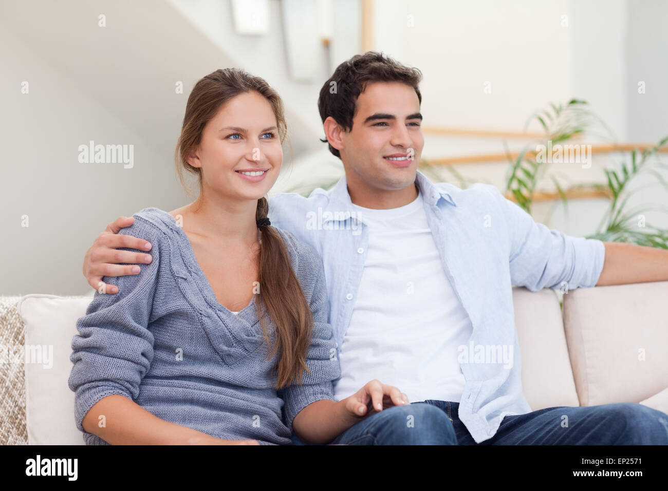 Couple watching a movie Stock Photo - Alamy