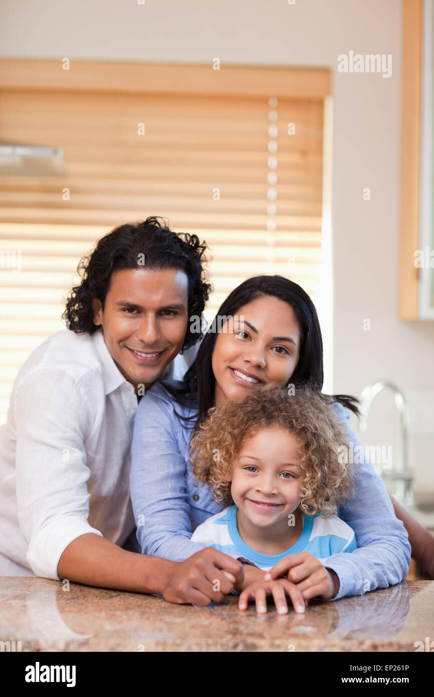 Happy smiling family together in the kitchen Stock Photo - Alamy