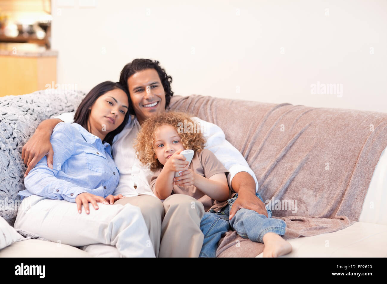 Family watching television together Stock Photo - Alamy