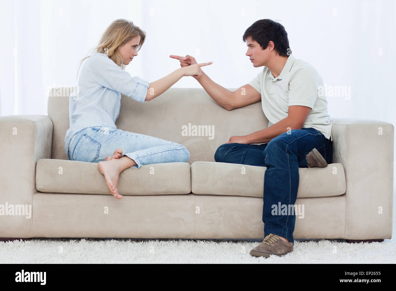Two women sitting opposite each other hi-res stock photography and ...