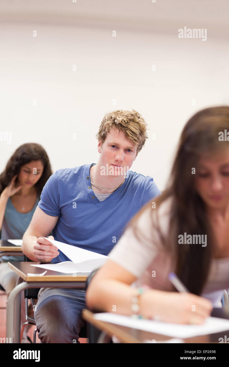 Portrait of young students having a test Stock Photo - Alamy