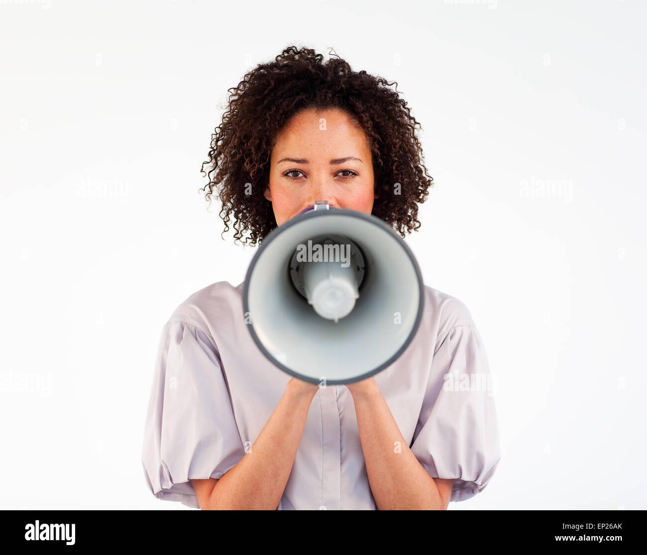Businesswoman speaking through a megaphone in front of the camera Stock ...