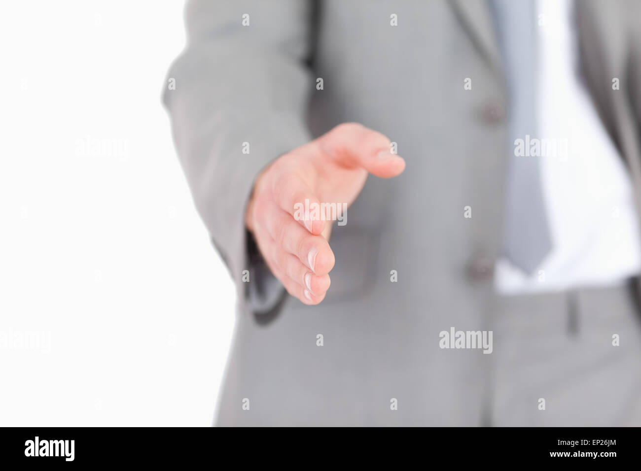 Businessman giving a helping hand Stock Photo - Alamy