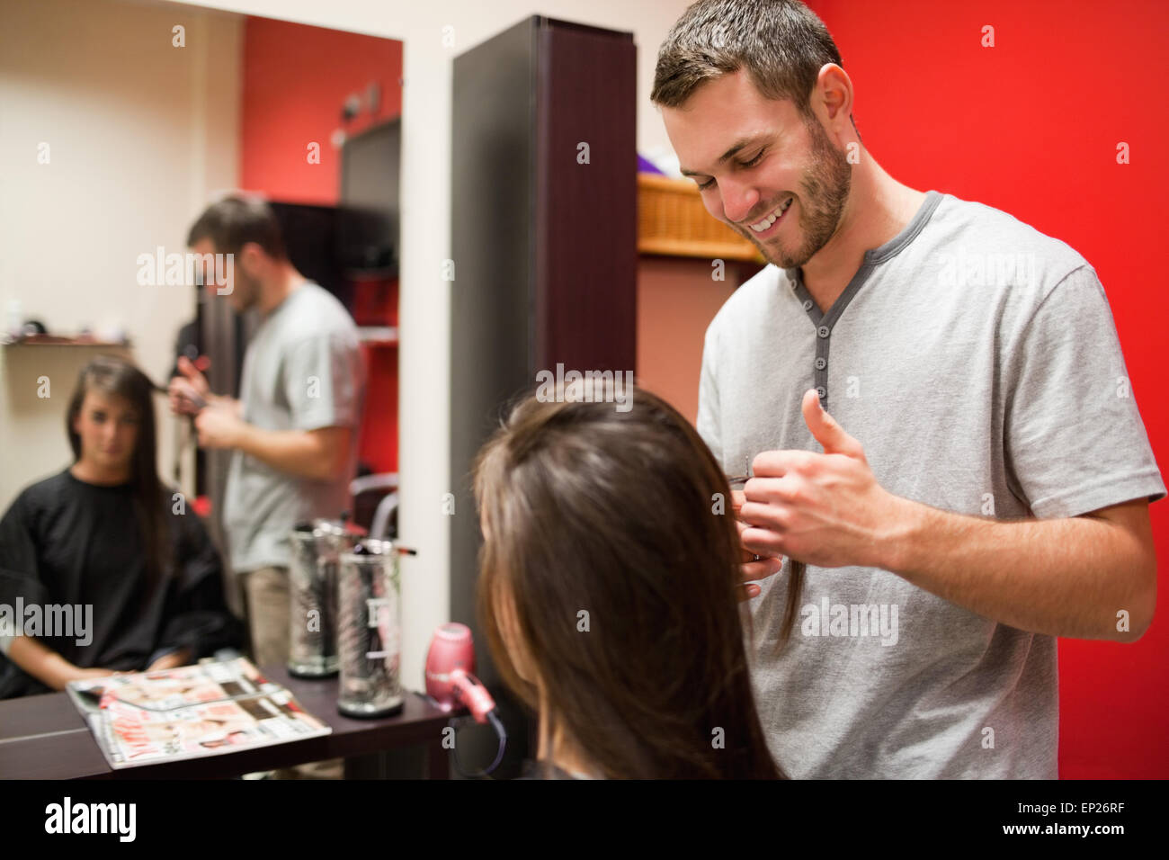 Smiling hairdresser working male hi-res stock photography and images ...