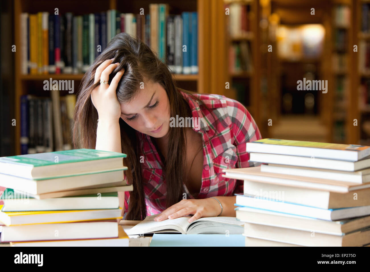 Surrounded by books college hi-res stock photography and images - Alamy