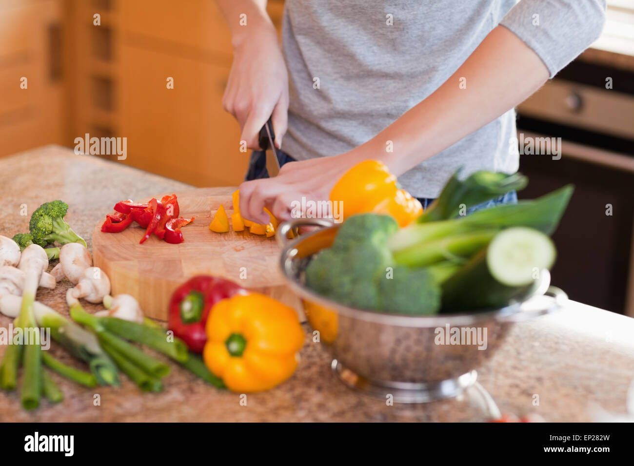 Vegetables being cut Stock Photo - Alamy