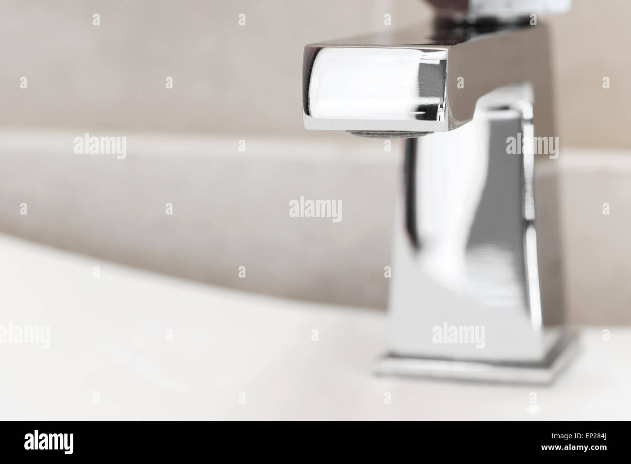 Faucet in bathroom, closeup Stock Photo - Alamy