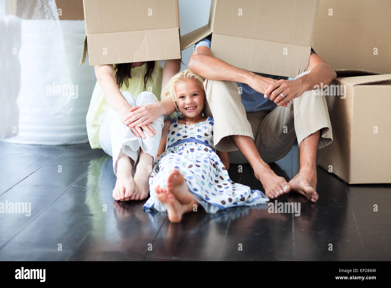 Family having fun after moving house Stock Photo - Alamy