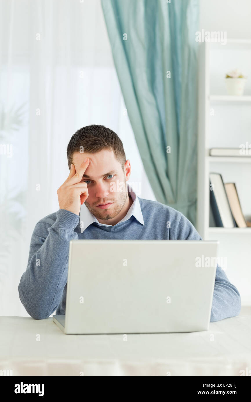 Worn out businessman in his homeoffice Stock Photo - Alamy