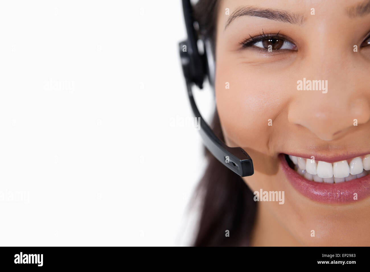 Smiling female call center agent with headset Stock Photo - Alamy