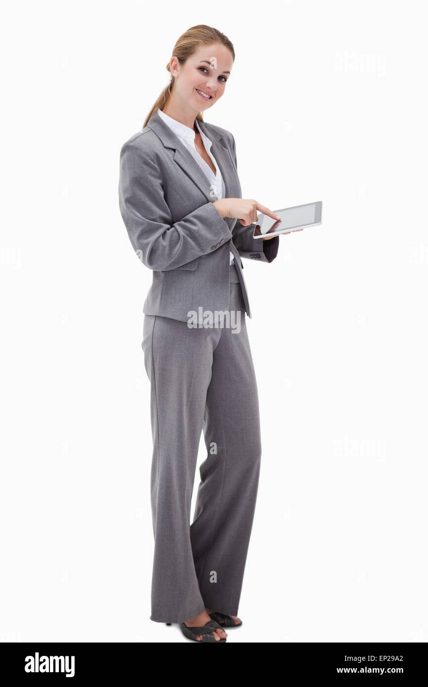 Side view of smiling bank employee using tablet Stock Photo - Alamy