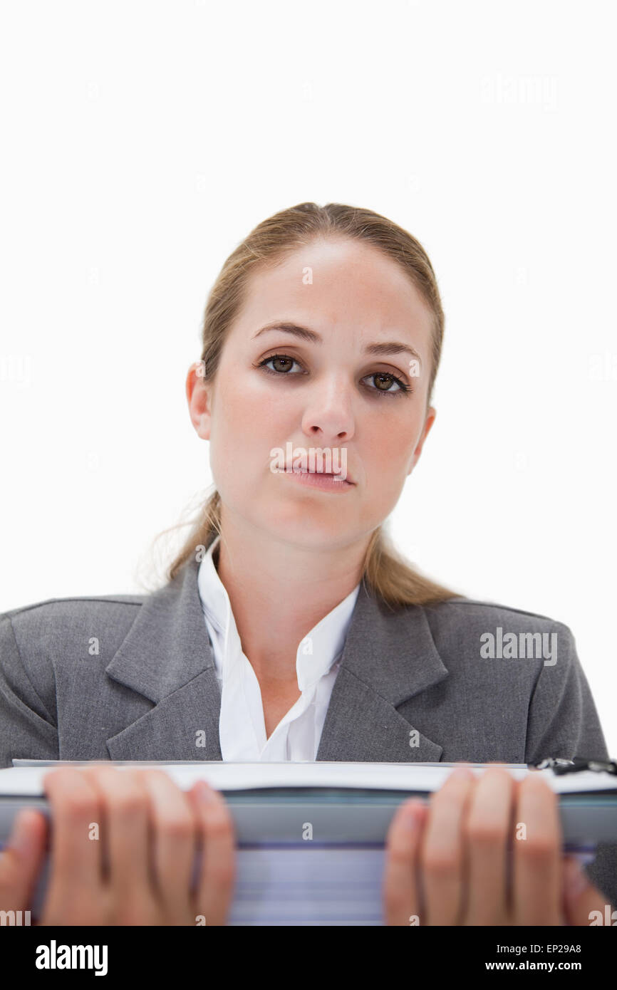 Frustrated office employee with pile of paperwork Stock Photo - Alamy