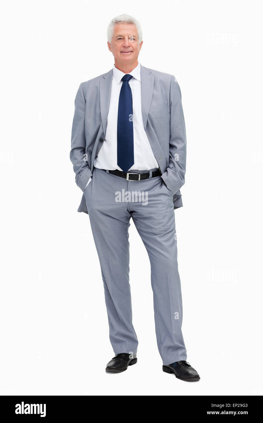 Portrait of a man in a suit with hands in the pockets Stock Photo - Alamy