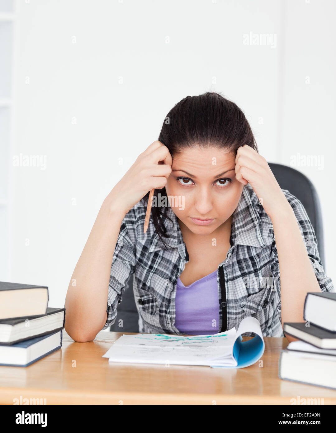 Stressed student looking to camera Stock Photo - Alamy