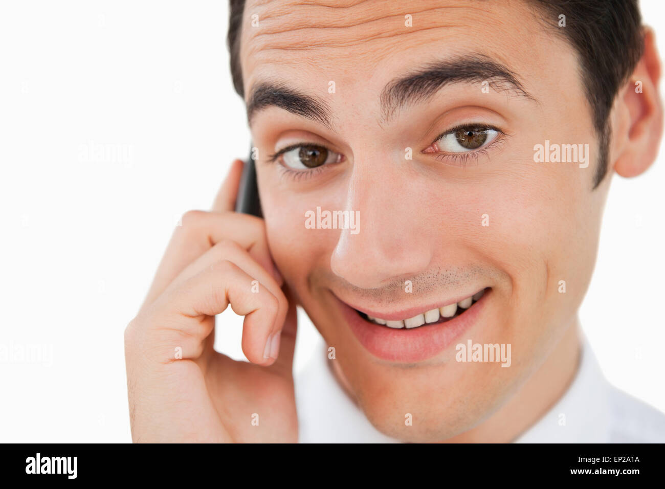 Close-up of a happy man calling with his cellphone Stock Photo - Alamy