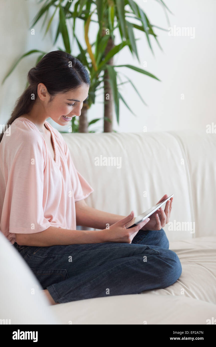 Portrait of a peaceful woman using a tablet computer Stock Photo - Alamy