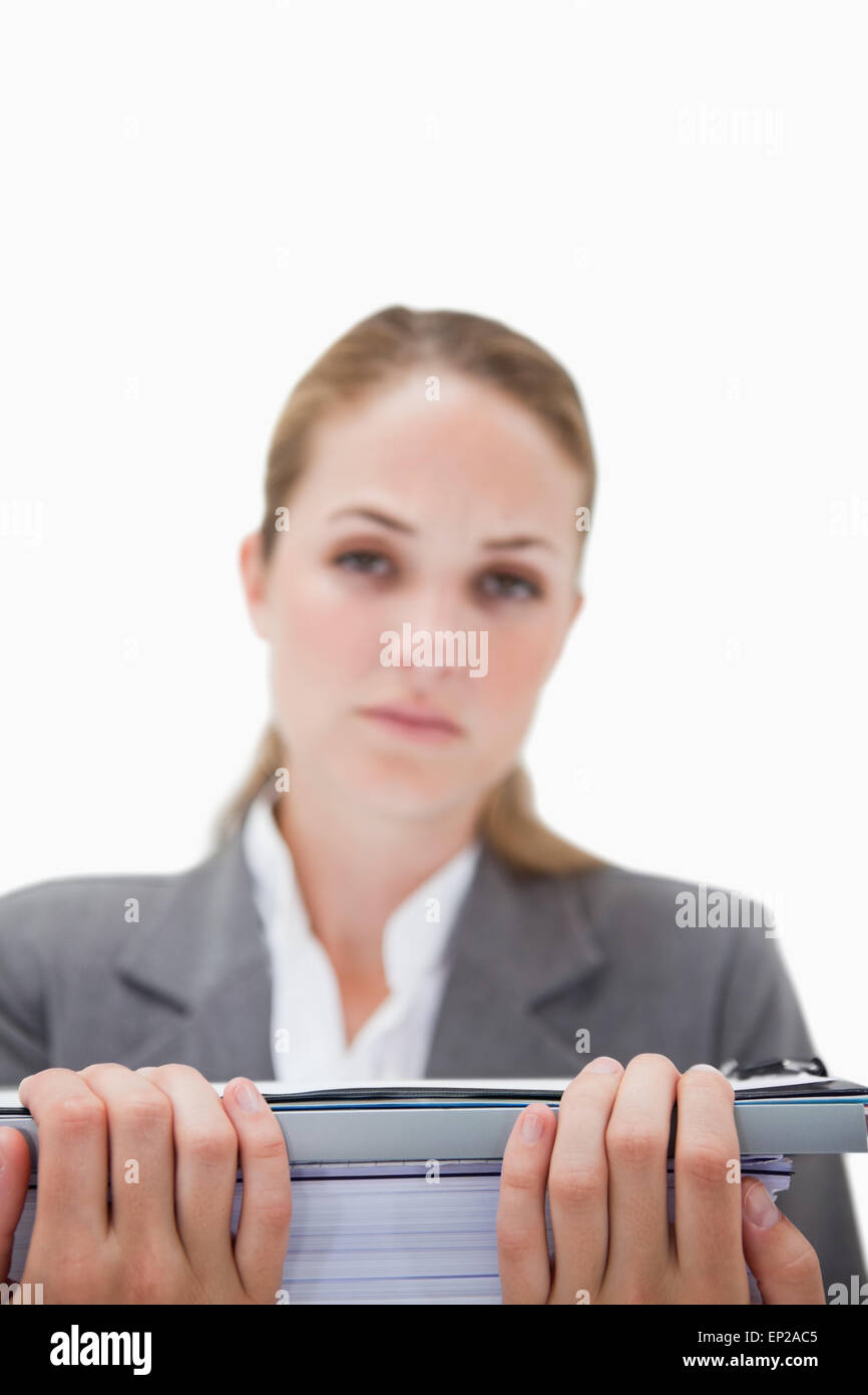 Pile of paperwork being held by office employee Stock Photo - Alamy