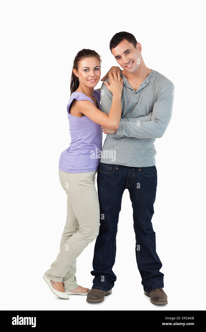 Young couple standing close together Stock Photo - Alamy