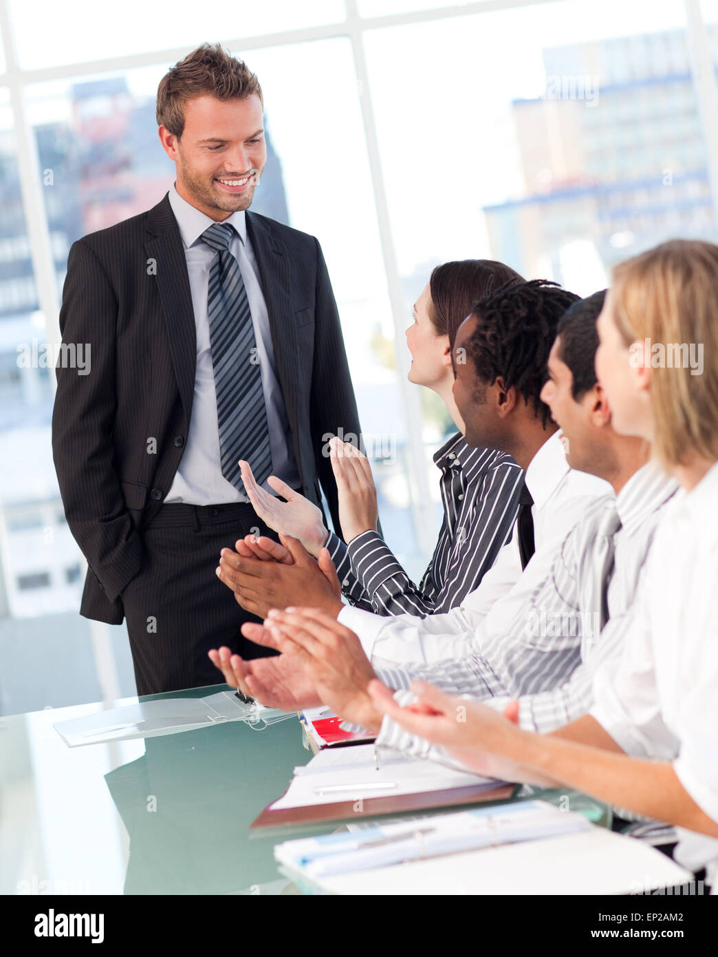Business people clapping after a presentation Stock Photo - Alamy