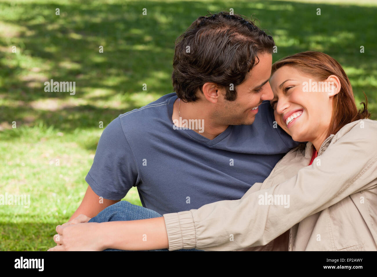 Woman rests her head on her friend's shoulder Stock Photo - Alamy