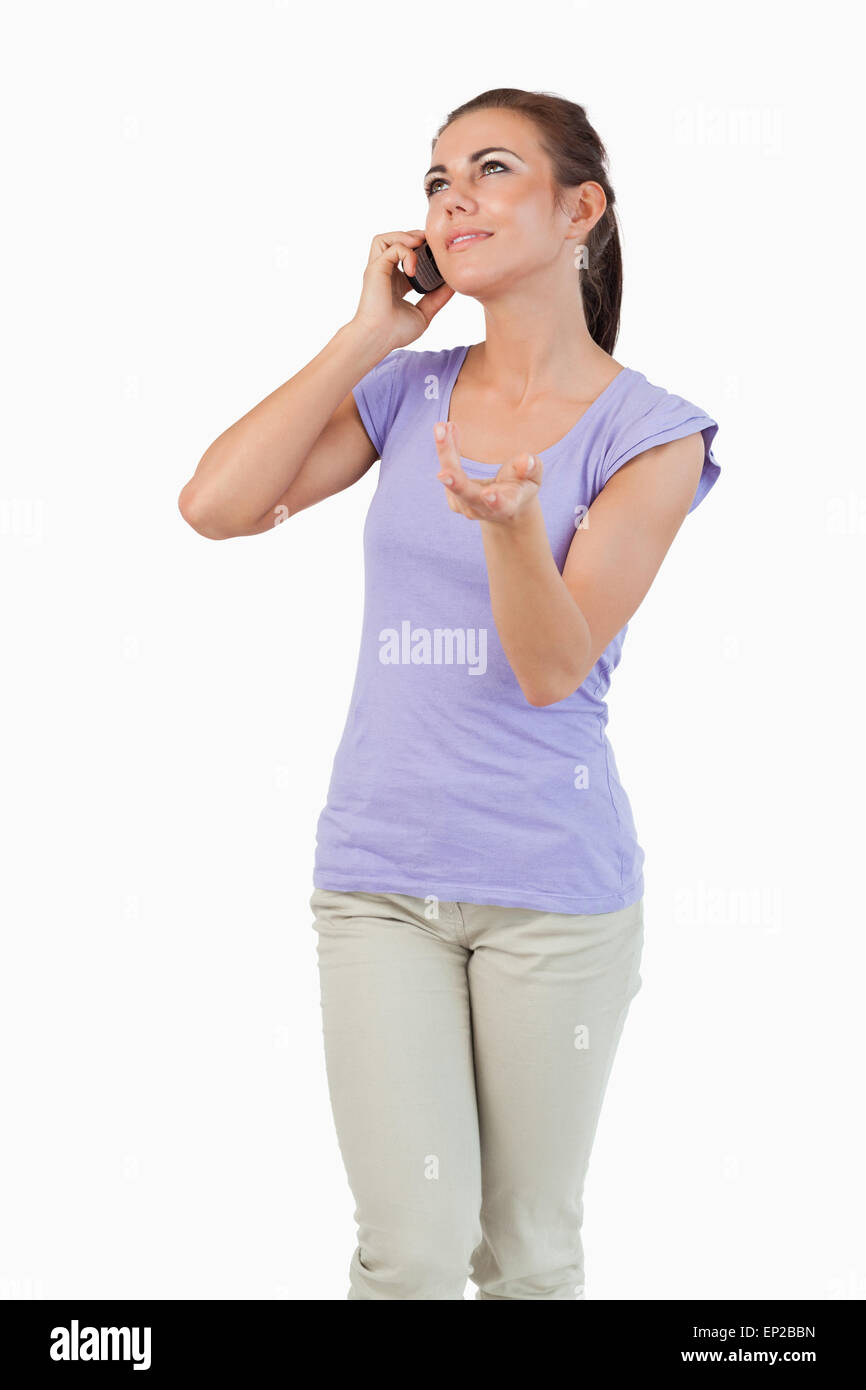 Young female talking on the phone Stock Photo - Alamy