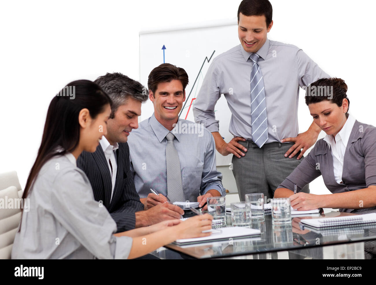 Young manager giving a presentation against a white background Stock ...