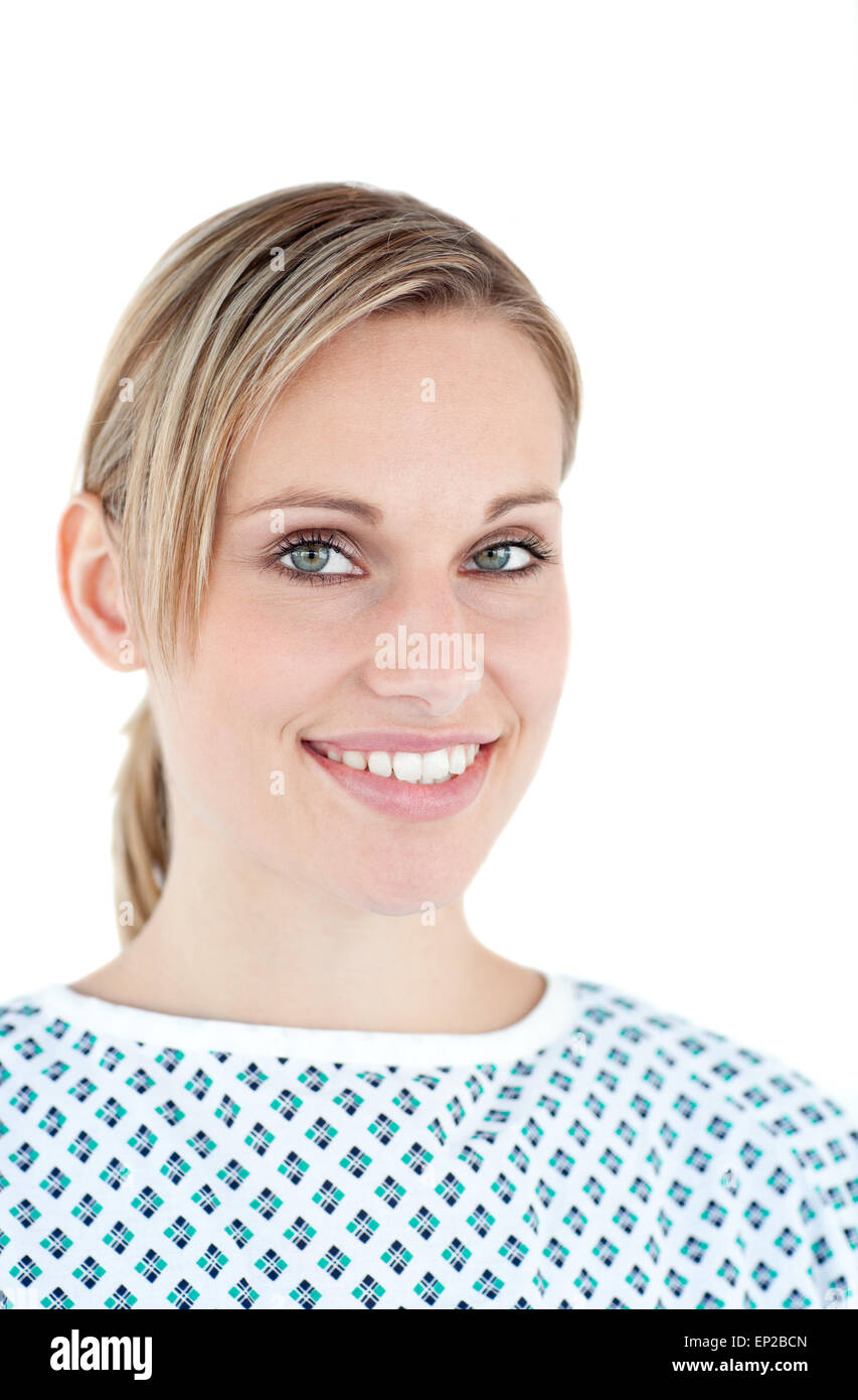 Portrait of a female patient against white background looking to the ...