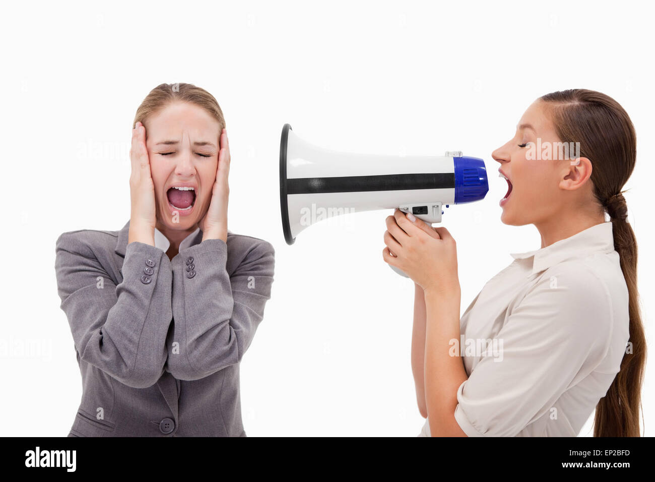 Young manager yelling at her employee through a megaphone Stock Photo ...