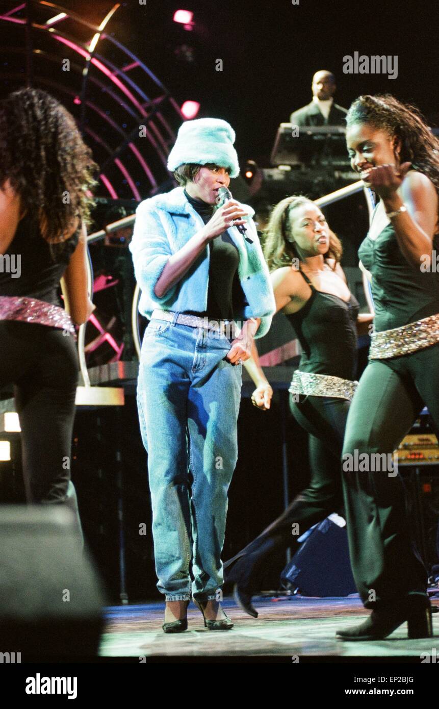 Whitney Houston performs at Wembley Arena London, on her "my love is your love" tour in blue fur ...