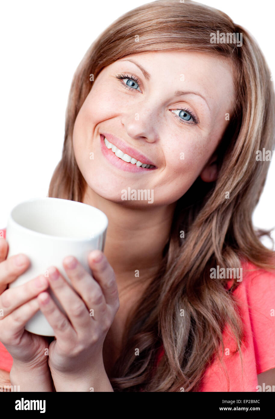 Cute woman drinking a cup of tea against a white background Stock Photo ...