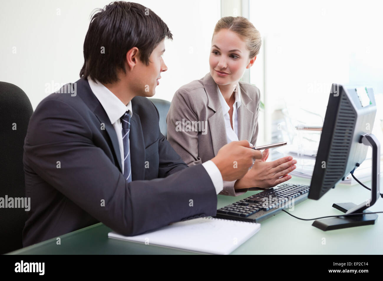 Business team working with a computer Stock Photo - Alamy