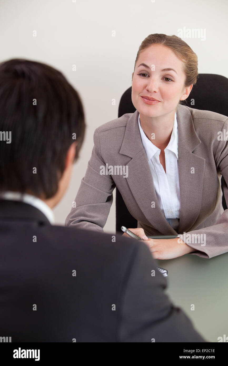 Portrait of a manager interviewing a male applicant Stock Photo - Alamy