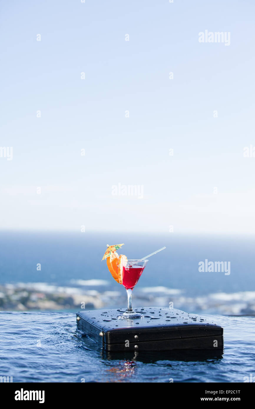 Portrait of a cocktail on a briefcase Stock Photo - Alamy