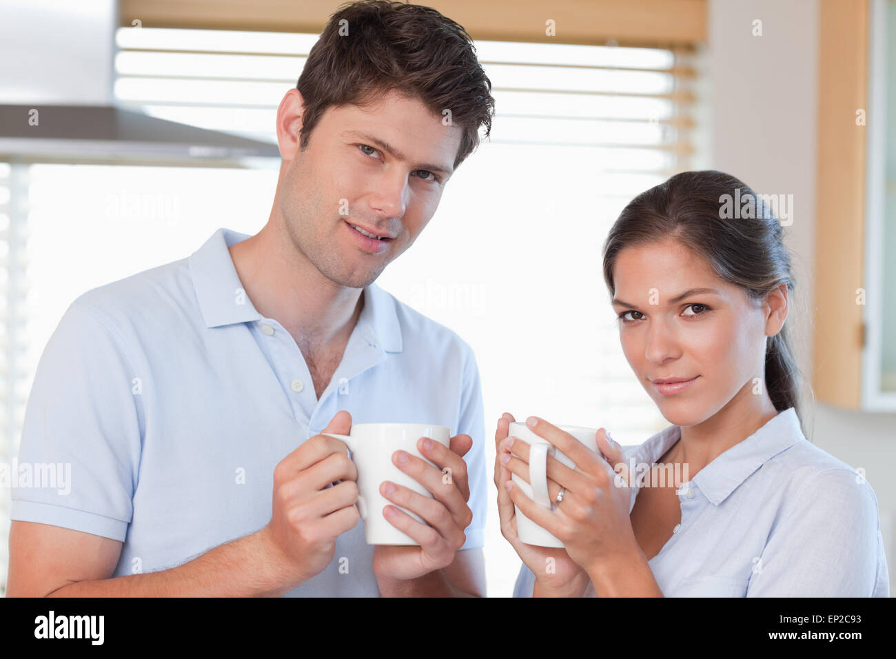 Couple drinking coffee Stock Photo - Alamy