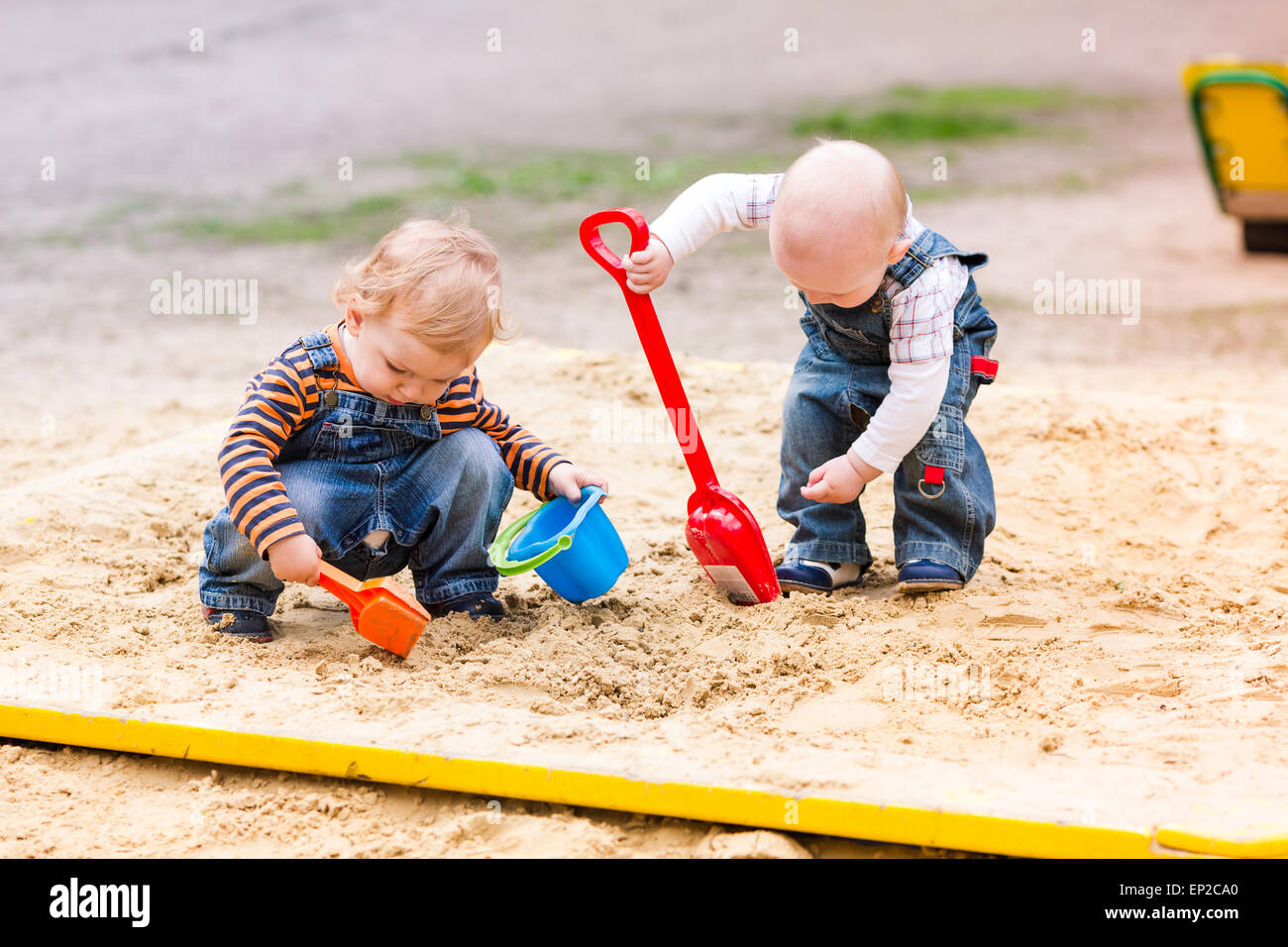 Two Children Playing Sandbox High Resolution Stock Photography and ...