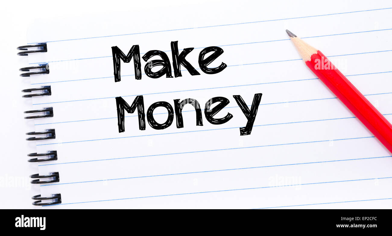 Make Money Text written on notebook page, red pencil on the right ...