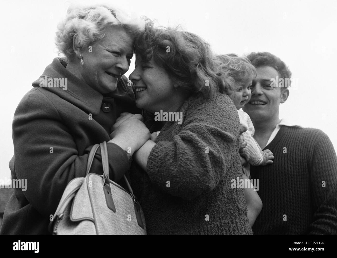 Mrs Doris Grant (left) seen here being reunited with here daughter ...