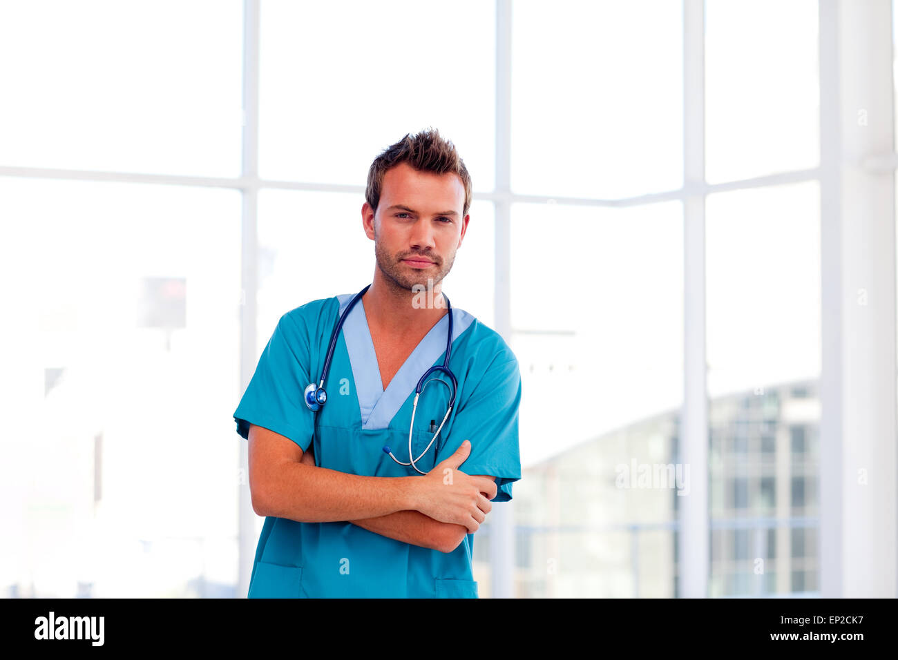 Handsome doctor isolated in hospital Stock Photo - Alamy