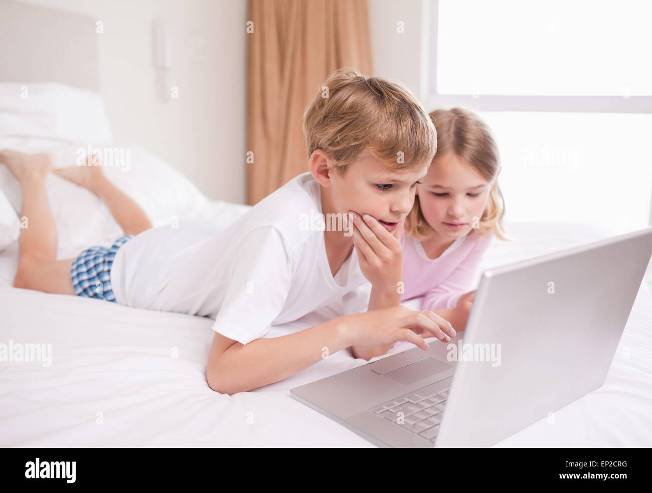 Children using a laptop Stock Photo - Alamy