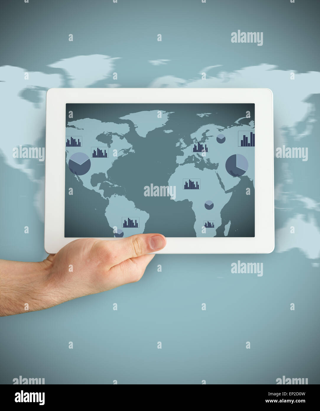 Hand holding a tablet PC showing business world map graphic Stock Photo ...