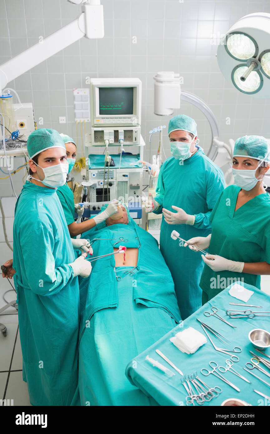 Group surgeons looking camera in hi-res stock photography and images ...