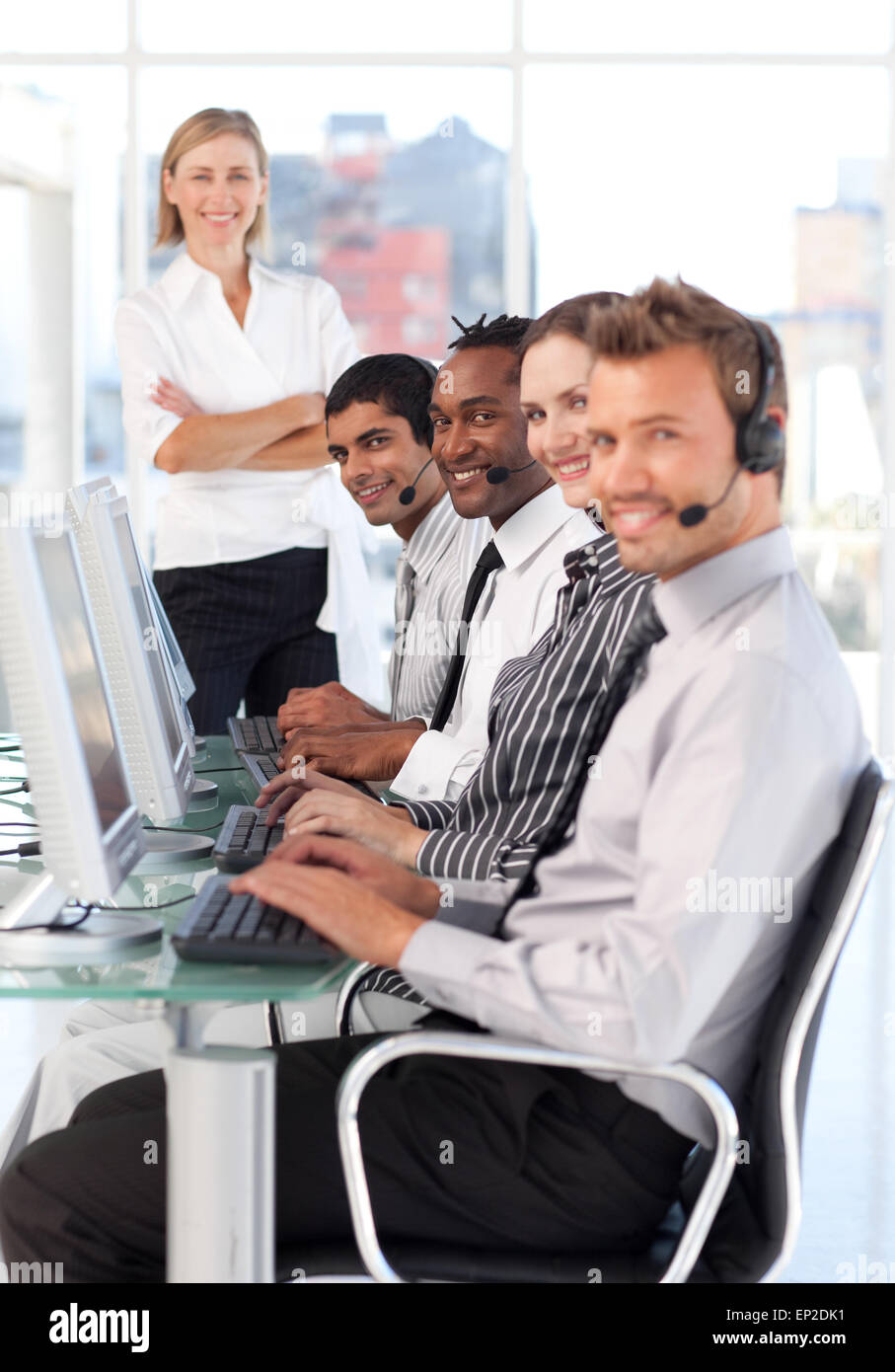 Cheerful manager leading her representative team Stock Photo - Alamy