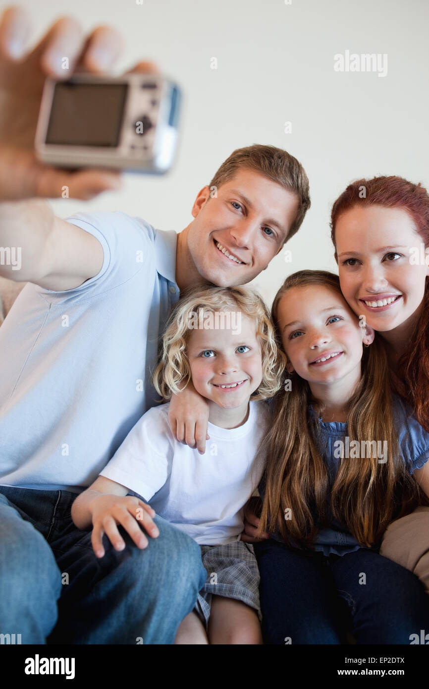 Father taking family picture with digi cam Stock Photo - Alamy