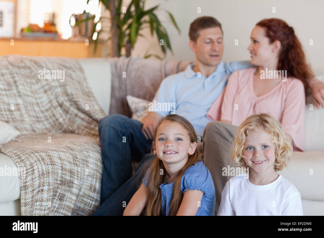 Family enjoying their time together Stock Photo - Alamy