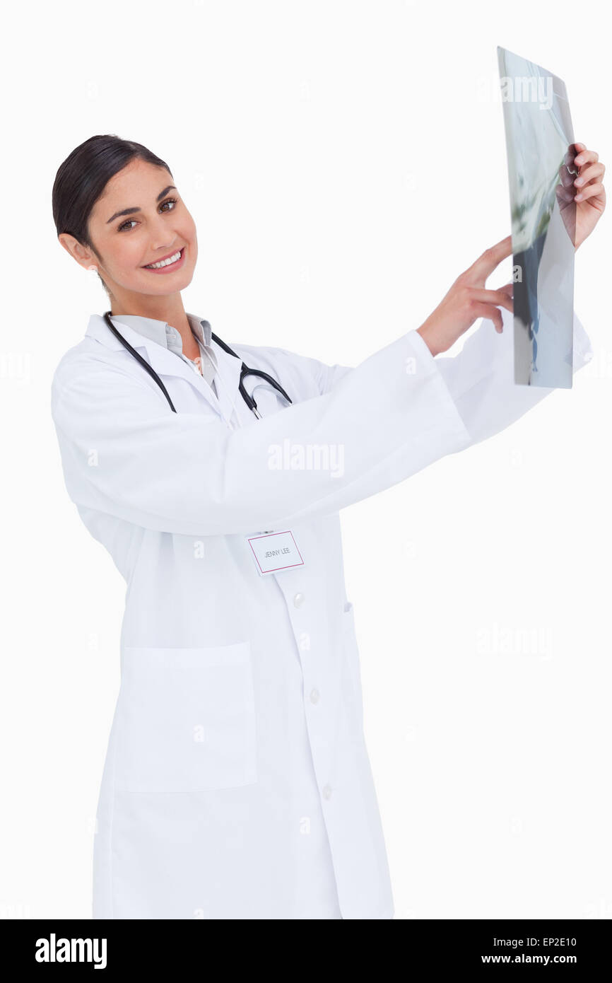 Side view of smiling female doctor holding x-ray Stock Photo - Alamy