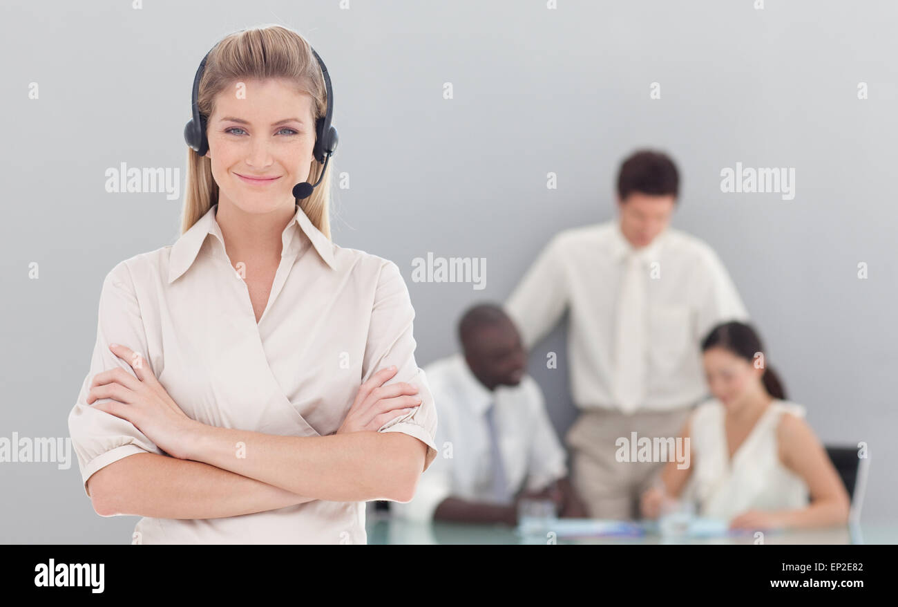 Positive female sales respresentative with her team Stock Photo - Alamy