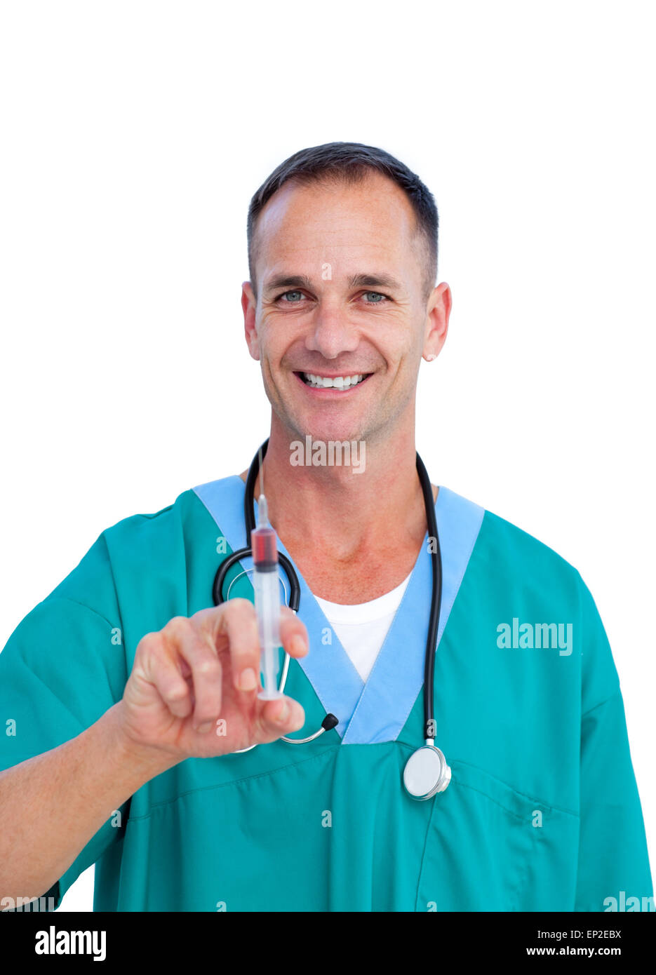 Portrait of a smiling doctor holding a syringe against a white ...