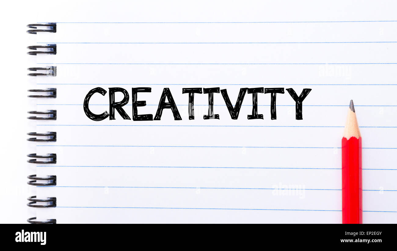 Creativity Text written on notebook page, red pencil on the right ...